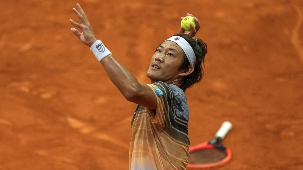 Zhang makes history for China by reaching Madrid last eight