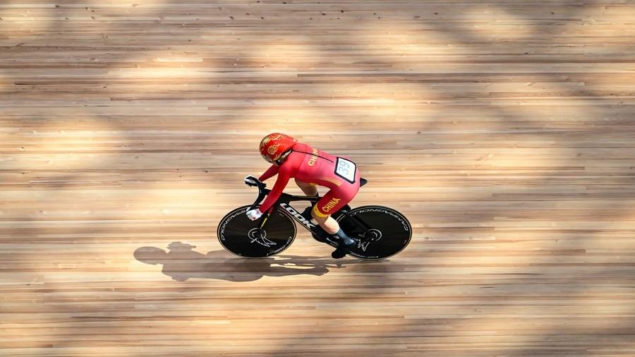 China sets Asian record in team track cycling win at Asiad