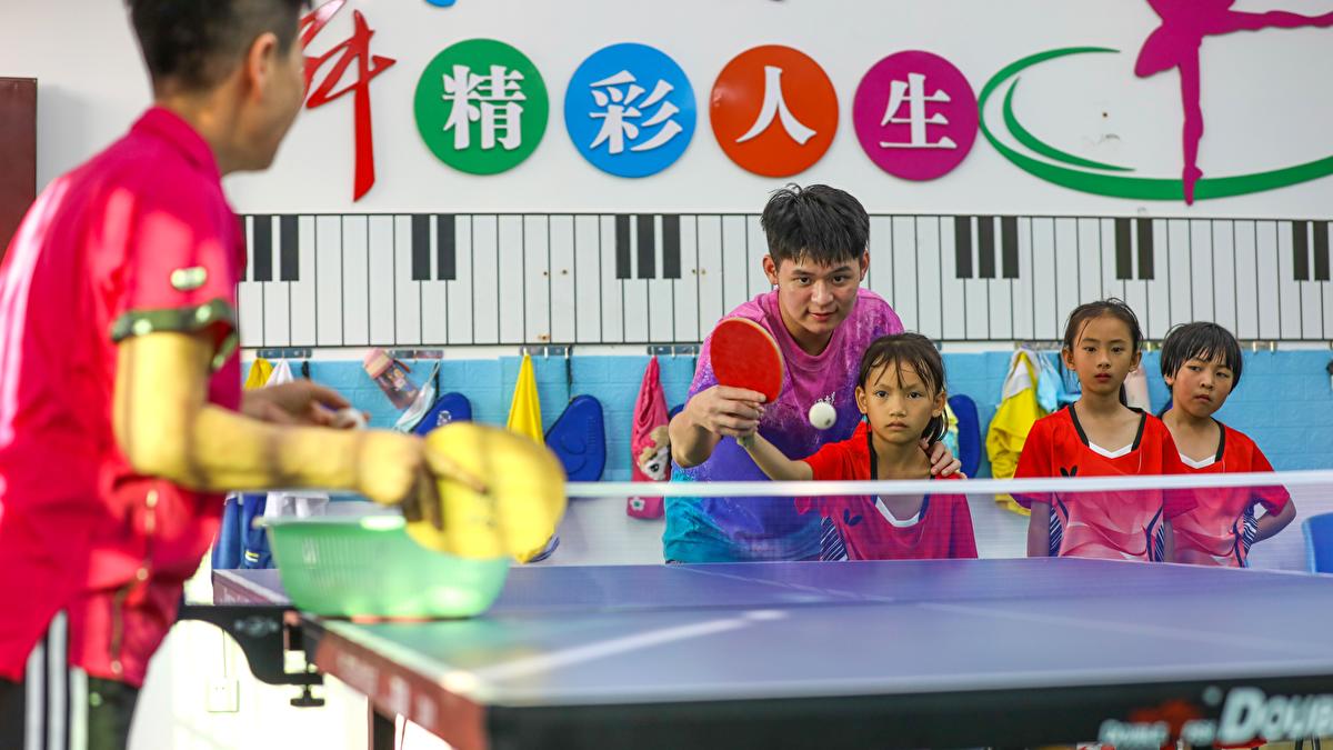 Coach serves up table tennis skills for students