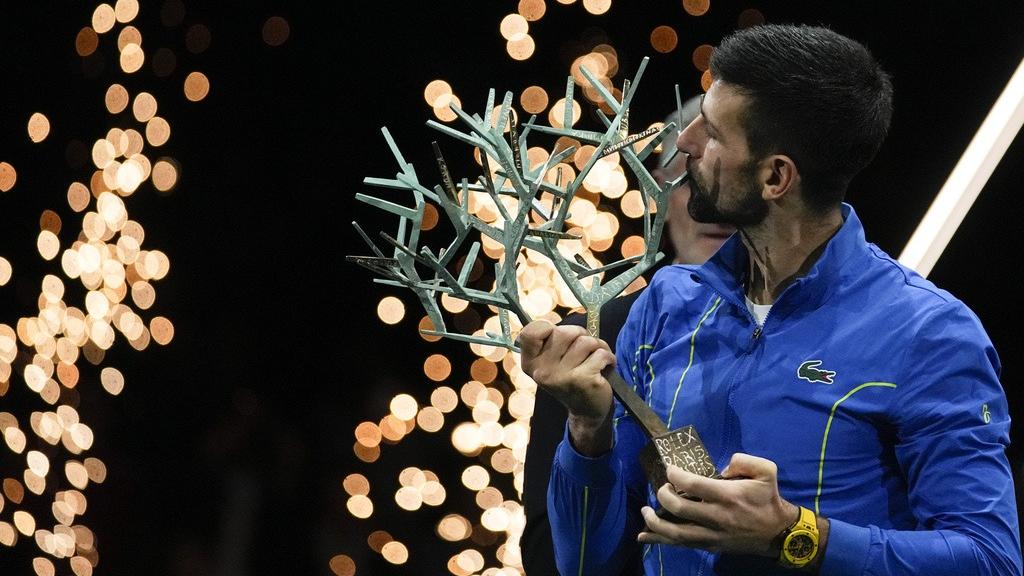 Djokovic eases past Dimitrov to win record-extending Paris title
