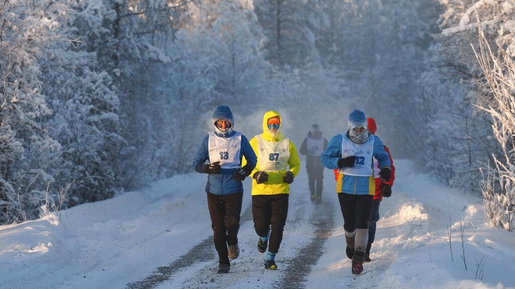 Ice-encrusted runners take on Siberian marathon at -52C
