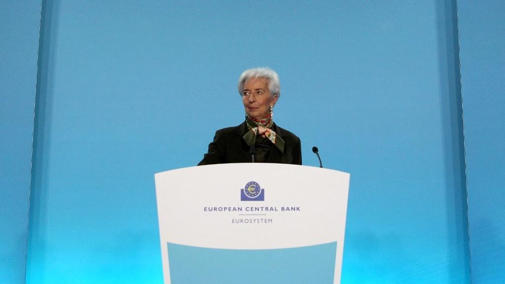 ECB raises rates, signals at least one more hike