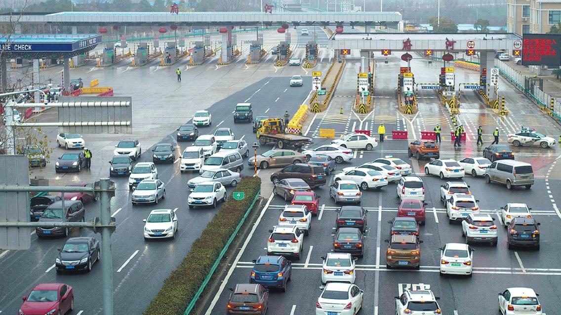 China to waive road tolls until outbreak ends