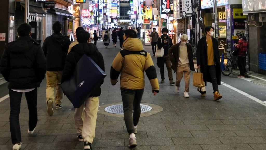 Japan's new virus cases hit record as state of emergency looms