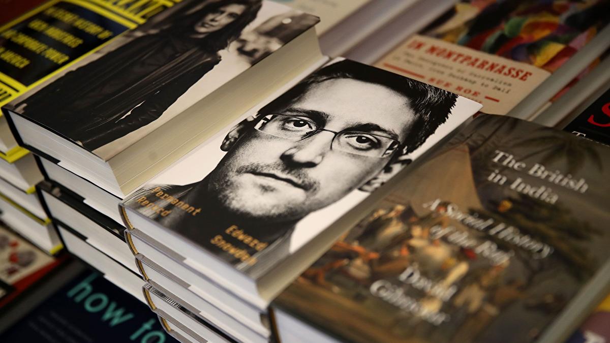 Snowden faces possible sanctions in suit over tell-all book