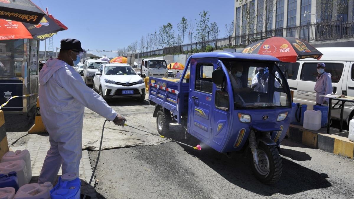 Mass testing underway in Urumqi as virus flares