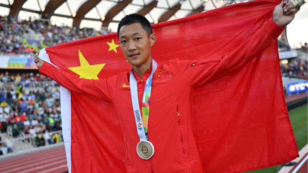 Wang's win reminds US coach of Powell's record-breaking moment