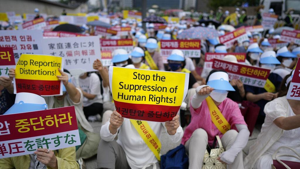 Unification Church members accuse Japan media of bias in Abe killing