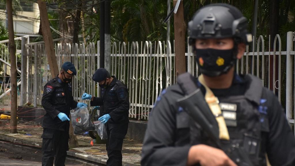 Indonesia raids yield explosives, suspects after church attack
