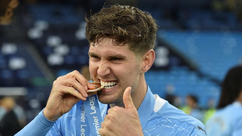 England defender Stones extends contract with Man City