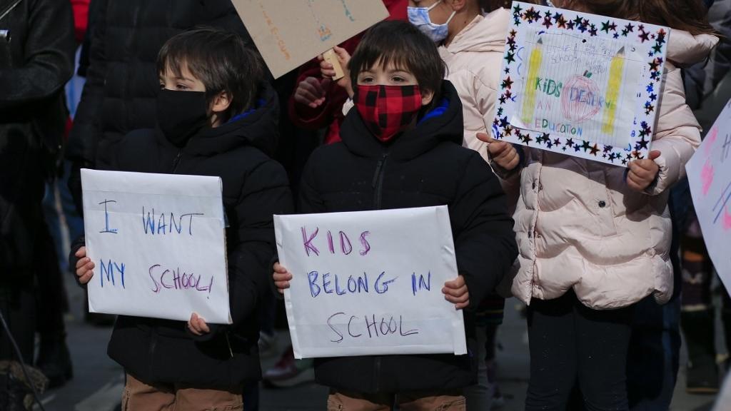 New York City closes public schools as cases climb