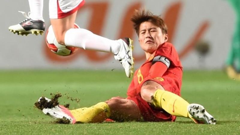 Veteran footballer Ma Jun gives it all for Olympic dream