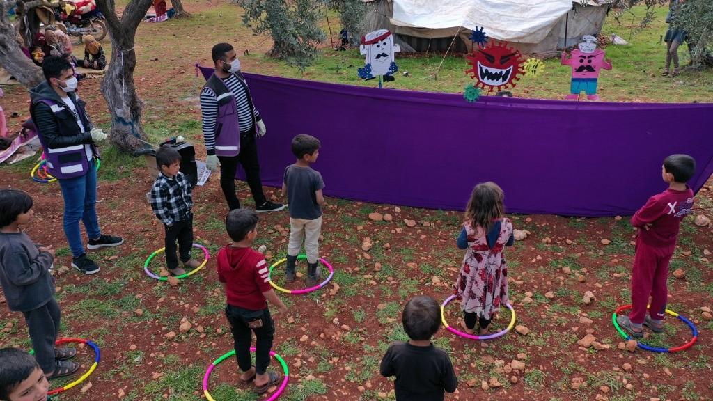 In Syria, puppets show displaced children how to deal with virus
