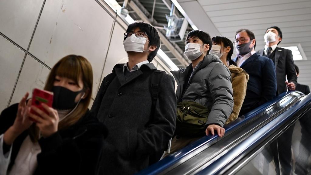 Japan extends virus emergency until March 7