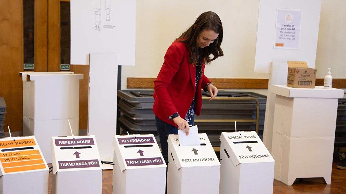 Ardern votes 2 weeks before NZ election day to urge early ballots