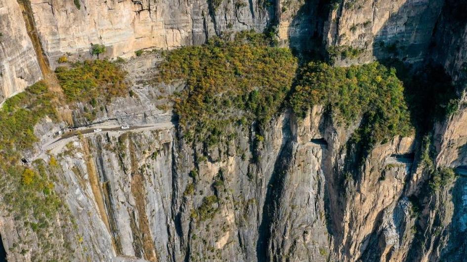 Villagers mimic fable by forging a path to prosperity