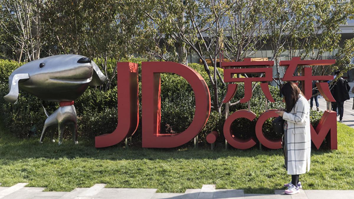 JD.com slides after e-commerce giant signals spending spree