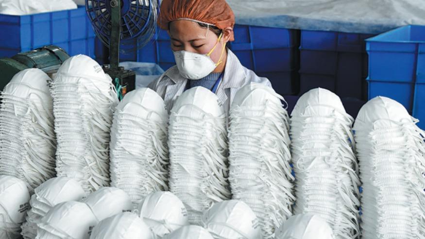 Nation's daily mask output exceeds 110m, NDRC says