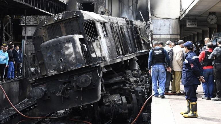 Egypt railcar crash, fire at central Cairo station kills 25
