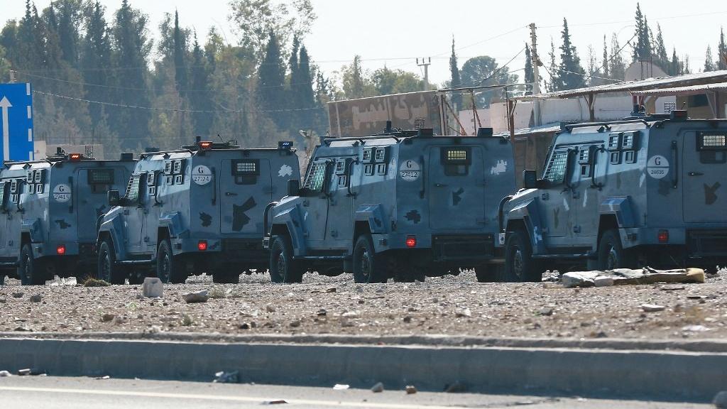 Jordan to step up security after police officer killed in 'riots'