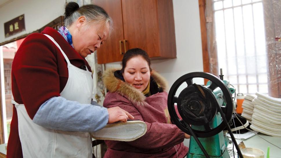 Traditional shoemaker steps up production to meet demand